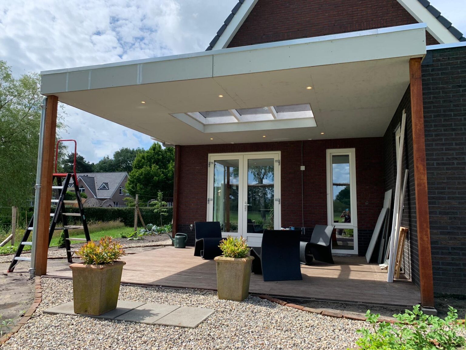 Houten overkapping aan huis in Zorgvlied: transformeer je tuin